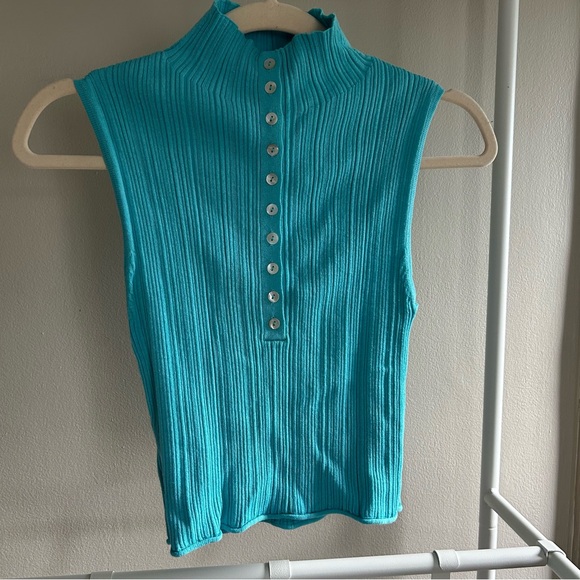 Zara | Tops | Zara Sleeveless Ribbed Turtleneck With Shell Buttons ...
